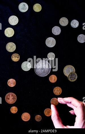 Various types of coins of different shapes, sizes and of different ...