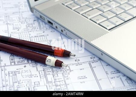 Laptop, rulers and pens on a floor map Stock Photo - Alamy