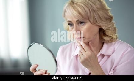 The elderly sagging , the face of Middle-aged woman Stock Photo - Alamy