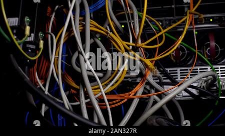Tangled wires in server room at television station Stock Photo - Alamy