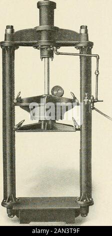 Screw bookbinding press over wooden stand. Isolated over white ...