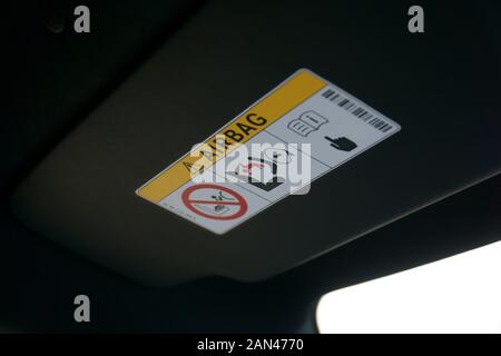 Car airbag warning sticker for on and off uses Stock Photo - Alamy
