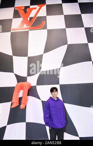 Chinese actor and singer Hou Minghao attends an activity in Beijing ...