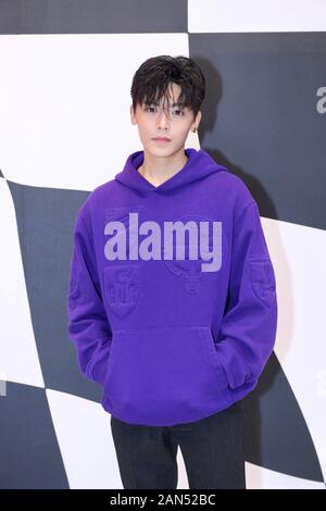 Chinese actor and singer Hou Minghao attends an activity in Beijing ...