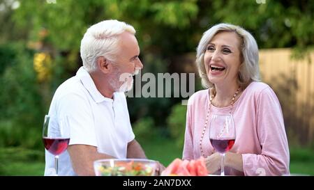 Couple is laughing at jokes Stock Photo - Alamy