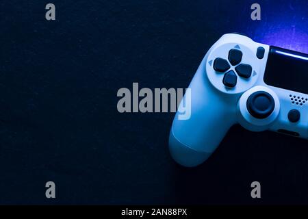 Video game controller at night with lights Stock Photo - Alamy