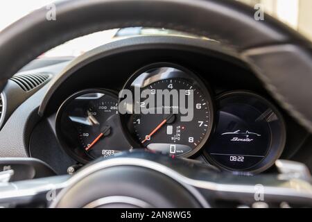 Porsche Macan interior - a steering wheel with buttons, dashboard ...