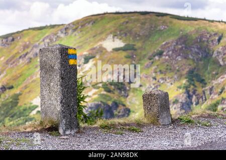 Blue and yellow square hiking markers, trail blazing symbol, Krkonose ...