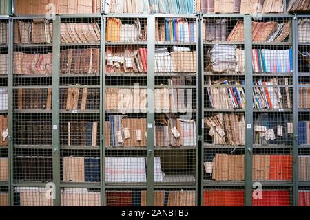 Locked bookshelves with plenty of old books Stock Photo - Alamy