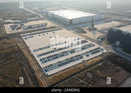 An aerial view of over 200 Tesla Model 3 arrayed in Tesla Gigafactory 3 ...