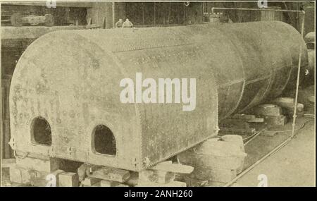 Two long metal exhaust pipes for ventilation on the wall of an old ...