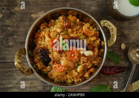 Bisi bele bath / Sambar rice- South indian rice lentil dish Stock Photo ...