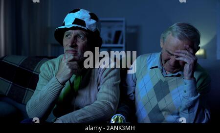 Football fans upset about losing favorite team Stock Photo - Alamy