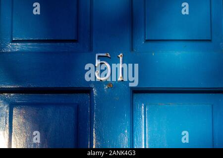 Number 51, fifty-one, old decorative tiles on green and blue background ...
