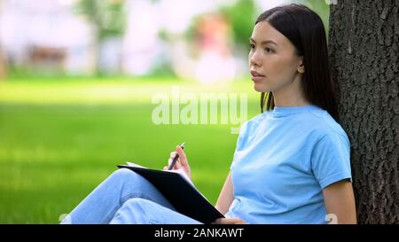 Creative inspiration of young female writer Stock Photo - Alamy
