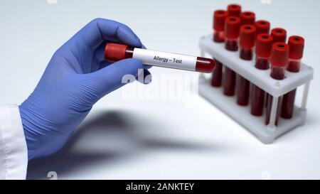 Dermatitis. Dermatitis disease blood test in doctor hand Stock Photo ...