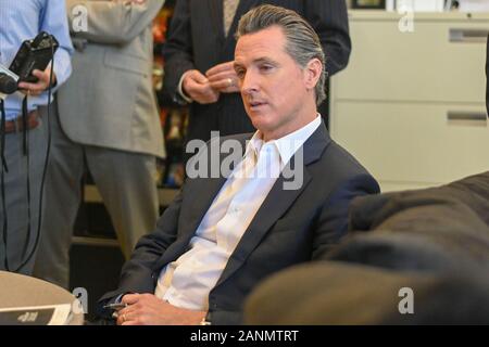 Gov. Gavin Newsom speaks at a news conference in Oakland, Calif ...