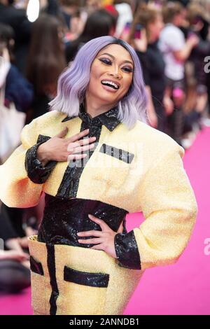 Drag queens take part in a catwalk show during the official opening of ...