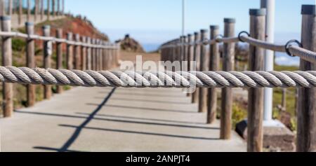 banister railing on marine rope and wood Stock Photo - Alamy