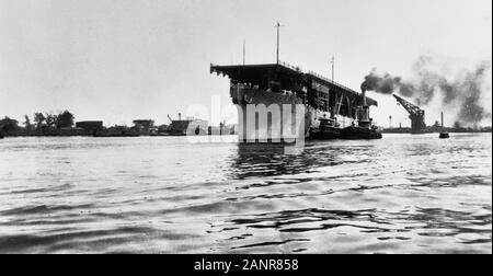 A photograph of the USS Langley (CV-1) aircraft carrier in drydock ...