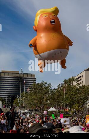 Donald Trump baby balloon is seen during the demonstration. Following ...