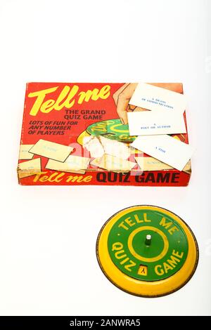 Old tatty vintage tell me game isolated on a white background with ...