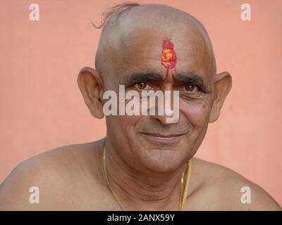 Nepali Brahman wedding priest and Hindu pundit performs a traditional ...