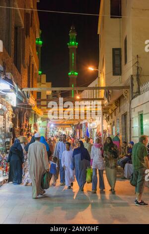Night scene of Main street at suq, also bazaar, city market, city ...
