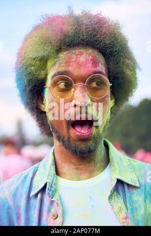 Young man with holi colors. holi is a festival of India. It is festival ...