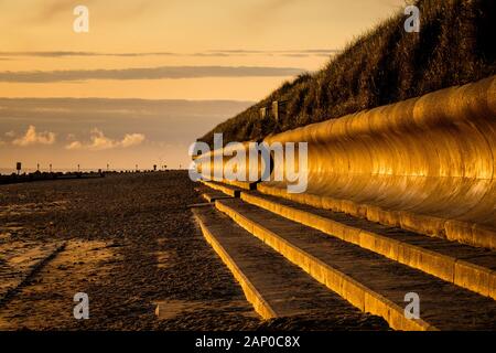 Concrete concave sea wall Stock Photo - Alamy