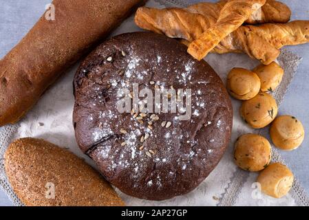 Different bread on table close-up Stock Photo - Alamy