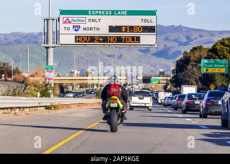 FasTrak Only express lane road sign. FasTrak is an electronic toll ...