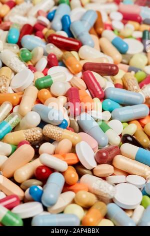 A lot of colorful medication pills drugs, top view Stock Photo - Alamy