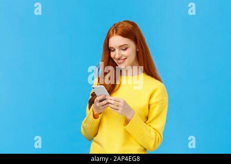Conversation, messaging and people concept. Redhead cute carefree girl ...