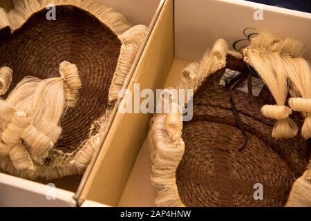 Two wigs as worn by some judges and barristers in England and Wales ...