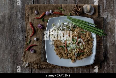 Asian eating food, Mee Grob is an sweet and sour crispy noodles, made ...