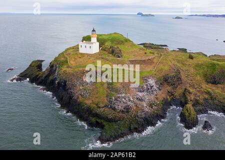 Aerial view of Fidra Island and lighthouse on Firth of Forth in East ...