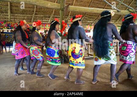 Embera Puru women and Men performing dance Village, Embera Puru Village in Panama, indigenous ...