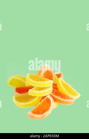 Lemon jelly, lemon slices and mint on black smokey background, top view ...