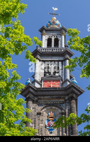 Amsterdam clock tower, cathedral and dutch architecture, Netherlands ...