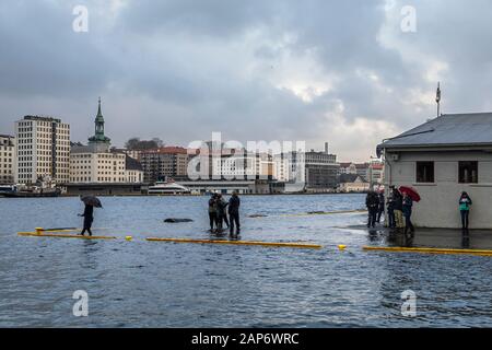 Port of Bergen, Norway. A day with exceptional high tide. Media people ...