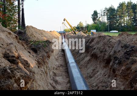 Pipelayer with side boom Installation of gas and crude oil pipes in ...