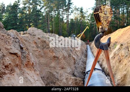 Pipelayer with side boom Installation of gas and crude oil pipes in ...