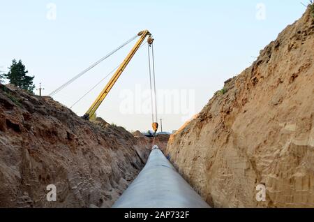 Pipelayer with side boom Installation of gas and crude oil pipes in ...
