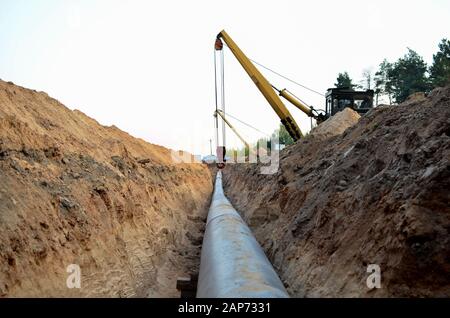 Pipelayer with side boom Installation of gas and crude oil pipes in ...