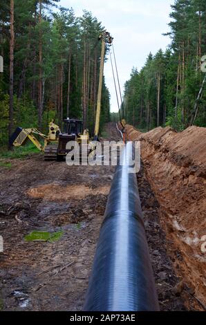 Pipelayer with side boom Installation of gas and crude oil pipes in ...