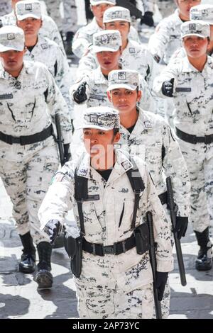 Members of the Mexican National Guards march in a parade to celebrate ...