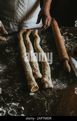 A Woman Prepares Homemade Braided Bread at Home Stock Photo - Alamy