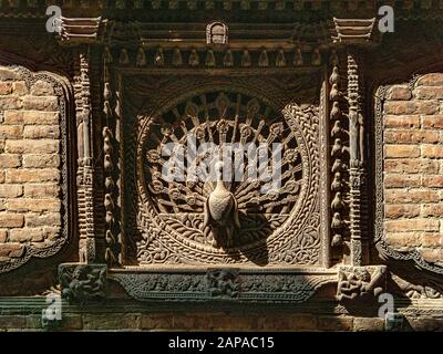The peacock window, famous wood carving in the city of Bhaktapur, Nepal ...