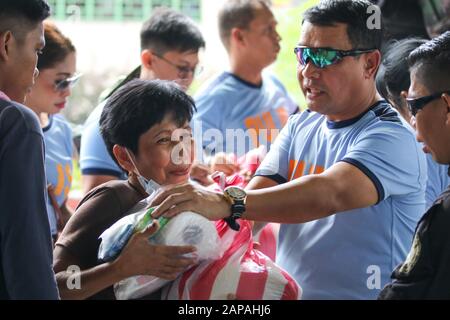Brigadier General Crizaldo Nieves seen giving releif goods to the ...